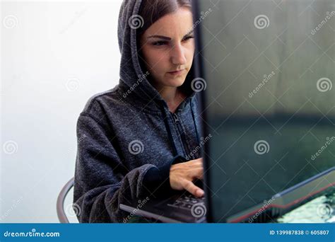 woman hacker programmer is working on computer in cyber security center