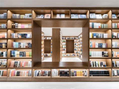 Wutopia Inserts Inverted Triangular Lightwell Into Book Shop