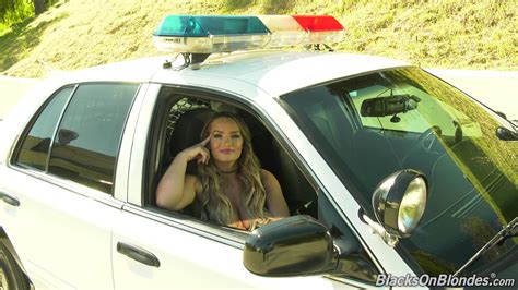Hot Porn Actress Cali Carter Gives An Interview Sitting In A Police Car
