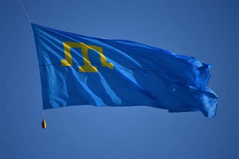 Flag Of The Crimean Tatar People On The Background Of Blue Sky · Free