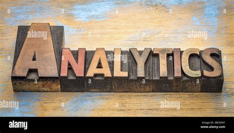 Analytics Word Typography Text In Vintage Letterpress Wood Type Against Grunge Wood Discovery