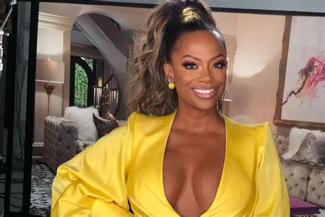 Kandi Burruss Poses Naked In A Bathtub Full Of Milk