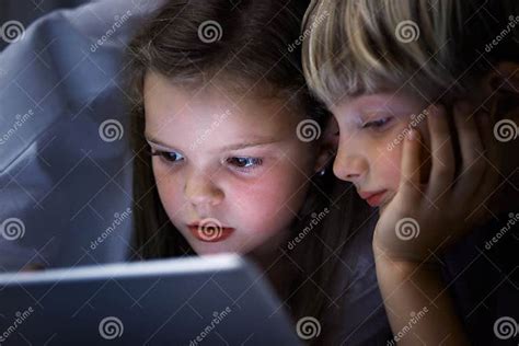 Siblings Are Our First Best Friend A Brother And Sister Using A Tablet