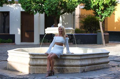 Beautiful Young Blonde Woman From The United States Is On A Sightseeing