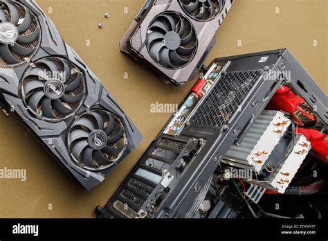 Graphics Card Upgrading Concept Two Gaming Graphics Cards Near Desktop Miditower ATX Pc Case On