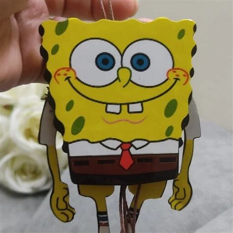 خرید و قیمت باب اسفنجی چوبی دو طرفه با دست و پاهای متحرک که با کشیدن نخ از زیر حرکت میکنند ترب