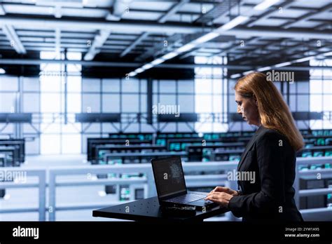 Admin In Data Center Using Laptop To Visualize Artificial Intelligence Neural Networks Made Up