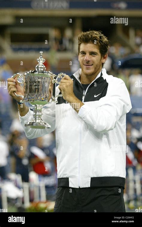 Juan Martin Del Potro Of Argentina With His Trophy After Beating Roger