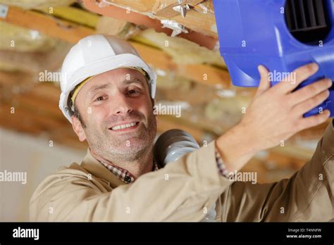 Man Installing Thermal Roof Insulation Layer Stock Photo Alamy
