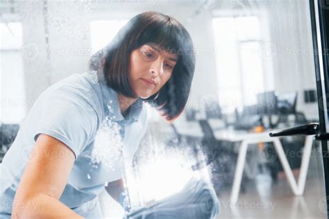 Woman Cleaning Dirty Window By Using Towel View Through The Glass 15361129 Stock Photo At Vecteezy