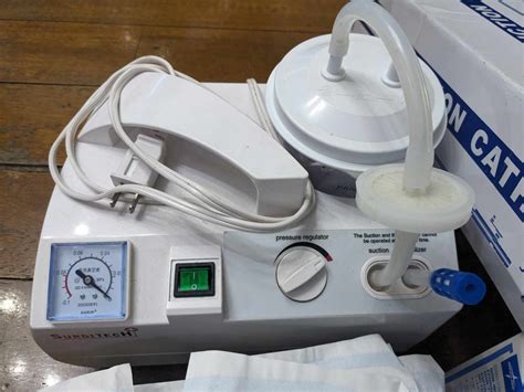 Surgitech Suction Machine With Nebulizer On Carousell