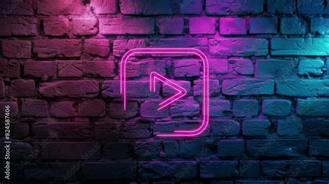Video Footage Of Pink Glowing Play Button Icon Neon Icon On Brick Wall