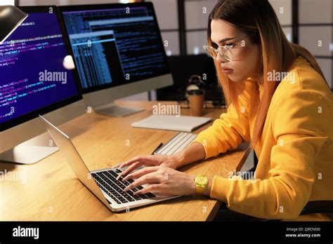 Transgender Programmer Working In Server Room Stock Photo Alamy