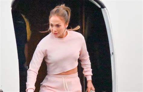 Jennifer Lopezs Pink Crop Top And Sweat Set Is Peak Jlo Private Jet Fashion
