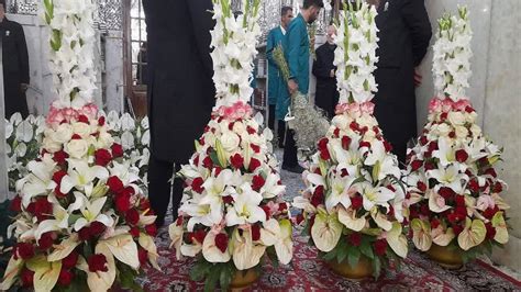 گل آرایی حرم امام رضا ع در دهه ولایت و امامت فیلم و تصاویر