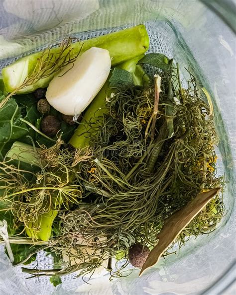 The Process Of Pickling Cucumbers For The Winter In Glass Jars Spices For Salting Are Laid Out