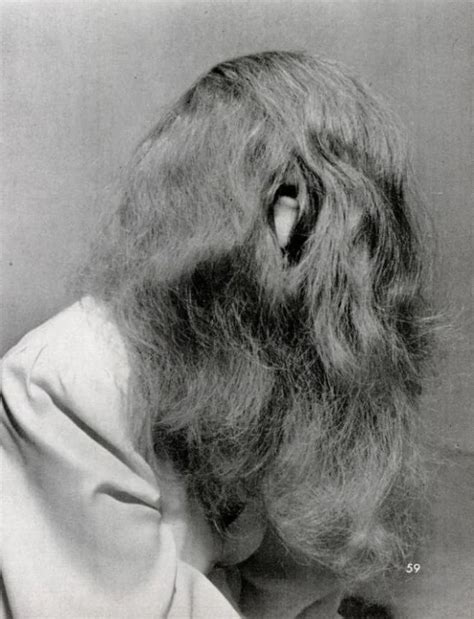 Veronica Lake Demonstrating How Her Peek A Boo Hairdo Could Get Caught