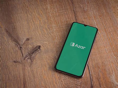 The Launch Screen Of Azar App Featuring Its Logo Displayed On A Black