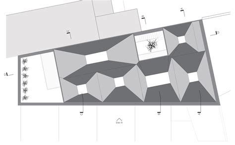 Vaulted House By Vppr Is Topped By Six Protruding Skylights