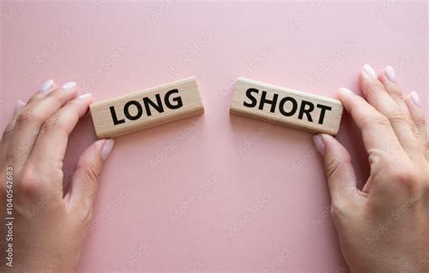 Short Vs Long Symbol Concept Word Short Vs Long On Wooden Blocks