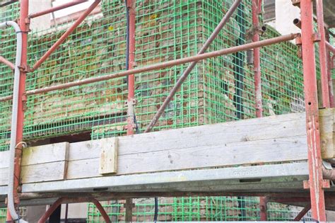 Structural Consolidation Of Old Brick Walls With Fiberglass Mesh