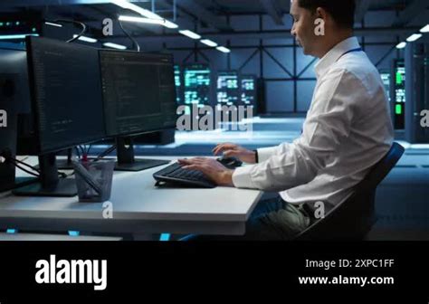 Engineer Overseeing Data Center Making Routine Improvements And