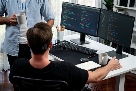 It Developers Discussing Online Software Development Information