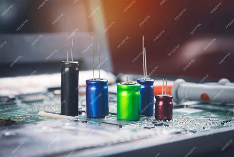 Premium Photo Electrolytic Capacitor Group On Electronic Circuit Board