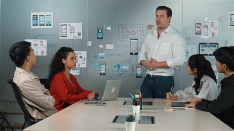 Group Of Business People Discuss About Using Ux And Ui Design Manipulator Stock Video Video