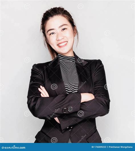 Young Smart Beautiful Asian Business Woman Wore Black Suit And Glasses