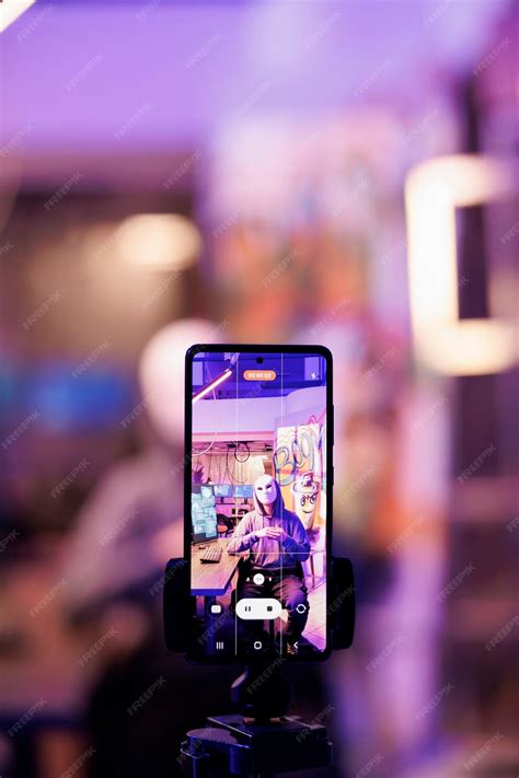 Premium Photo Anonymous Man On Smartphone Screen Recording Threat Video To Steal Data Hacker