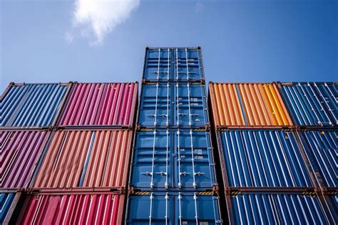 Premium Photo A Stack Of Shipping Containers