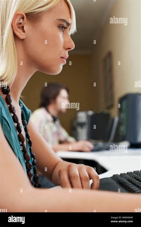 Woman In Computer Lab Stock Photo Alamy