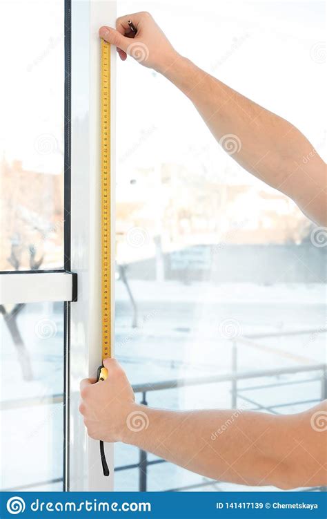 Service Man Measuring Window For Installation Indoors Stock Image Image Of Measurement Build
