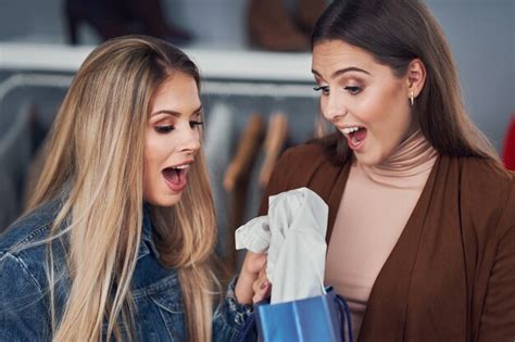 Premium Photo Adult Woman Shopping For Clothes In The City Center In