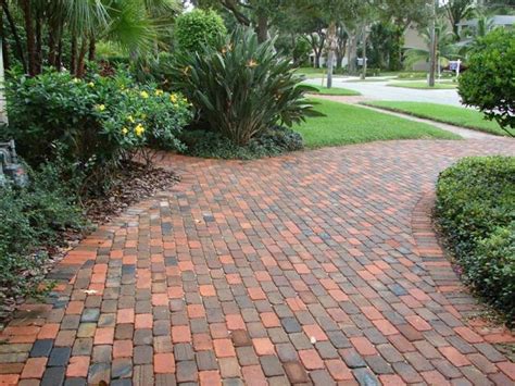 Different Types Of Driveway Surfaces Brick Driveway Driveway Design Driveway Landscaping