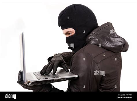 hacker stealing data from laptop computer isolated on white stock