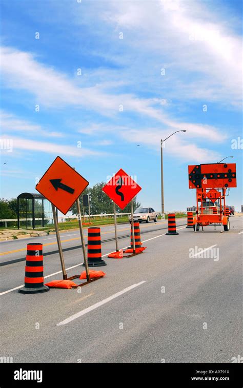 Road Construction Signs And Cones On A City Street Stock Photo Alamy