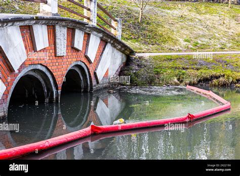 Artificial Dam On A Pond To Catch Floating Debris Clearing A Pond Of Debris Floating Garbage