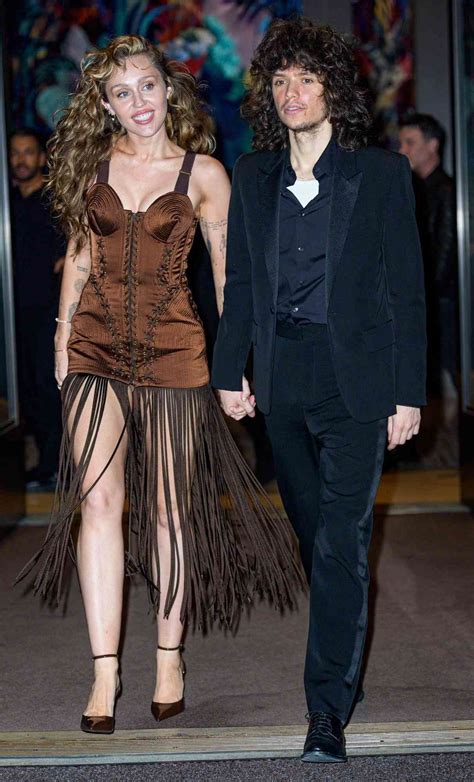 Miley Cyrus And Maxx Morando Match Step Out With Matching Curly Hairstyles