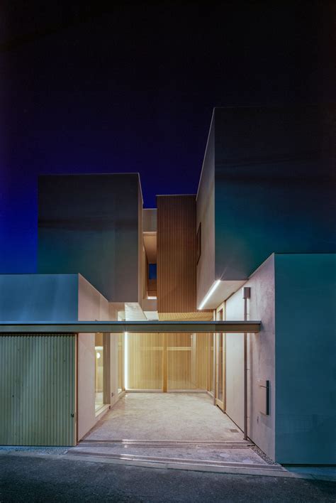 Fujiwaramuro Architects Overlaps Concrete Boxes For House In Tsurumi Ku