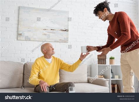 Grandpa And Grandson Drinking Tea Over Royalty Free Licensable Stock Photos Shutterstock