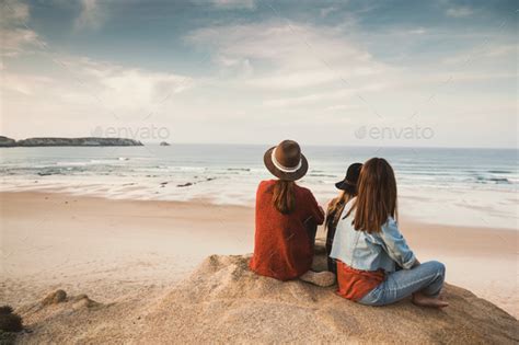 Girs Enjoying A Day On The Beach Stock Photo By Ikostudio Photodune