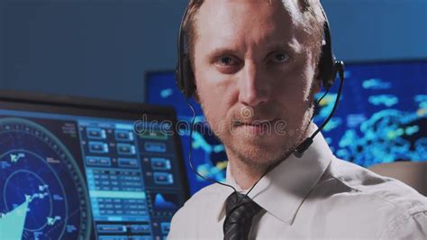Professional Air Traffic Controller In The Control Tower Aircraft Control Officer Works Using