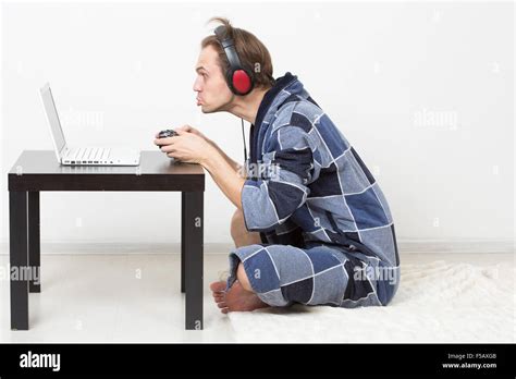 Man Playing On Laptop In Hi Res Stock Photography And Images Alamy