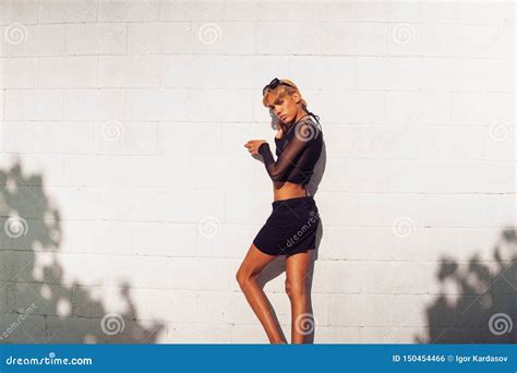 Beautiful Shemale Woman Posing Near The Wall Stock Photo Image Of Homosexual Slim