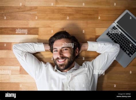 Man Lying On The Floor Stock Photo Alamy