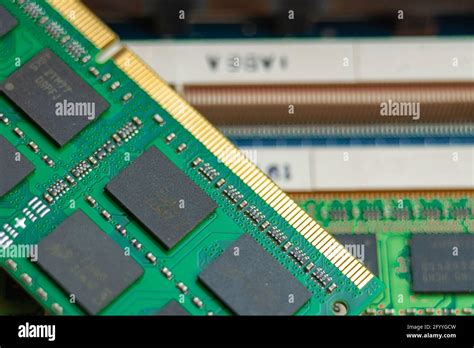 Master Holds Laptop RAM Close Up On Motherboard Background Stock Photo Alamy
