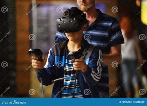 virtual reality htc vive headset and hand controls editorial photo