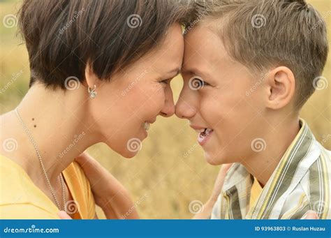 Mother And Son Standing Face To Face Stock Image Image Of Complicity Mother